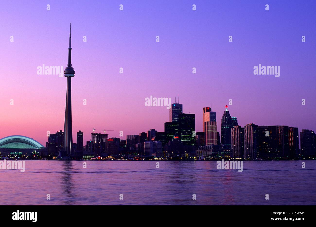 CANADA, ONTARIO, TORONTO, SKYLINE WITH SKY DOME AND CN TOWER, EVENING ...