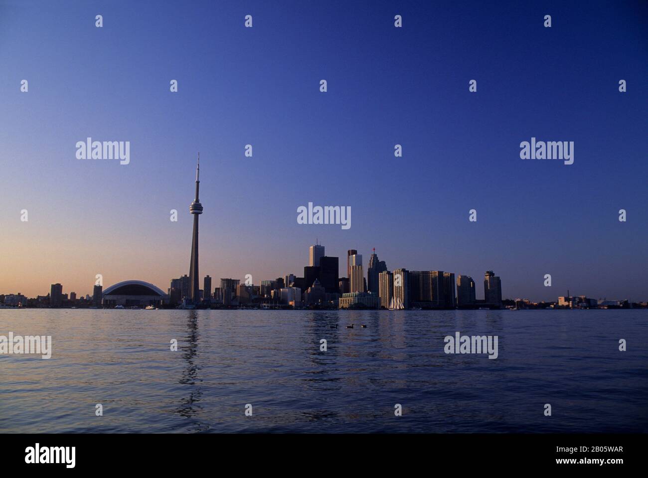 CANADA, ONTARIO, TORONTO, SKYLINE WITH SKY DOME AND CN TOWER, EVENING ...