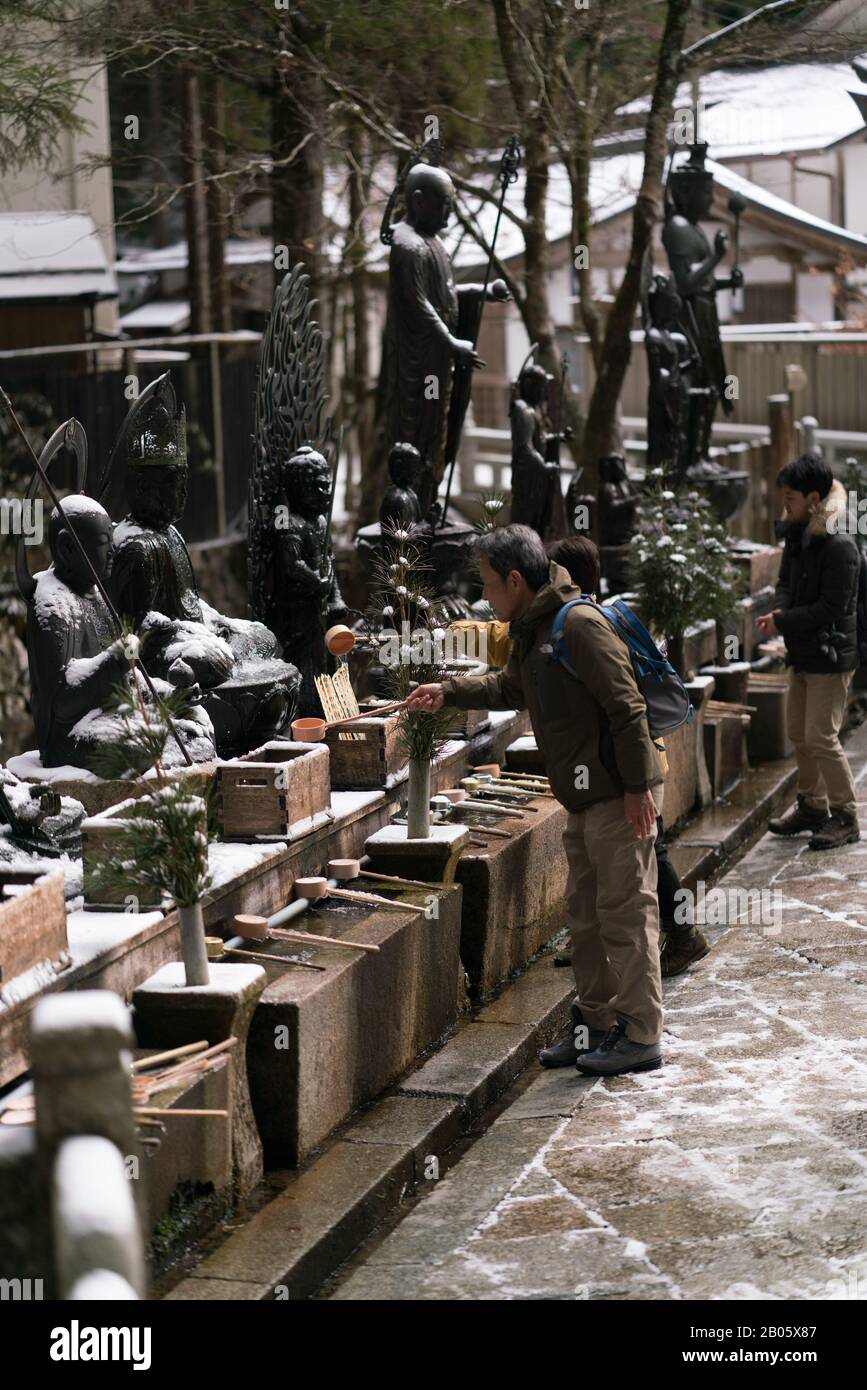 Okunoin, Japan's largest cemetery, located on Mt. Koya, the birthplace ...