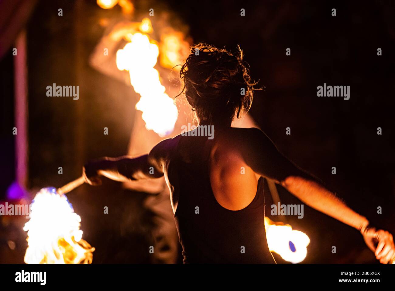 Professional fire dancers put on a show during event celebrating nature ...
