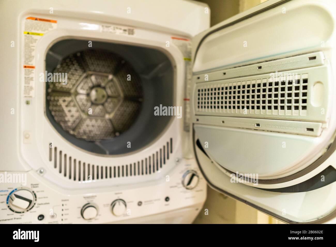 Dryer of a laundry machine, open door Stock Photo - Alamy
