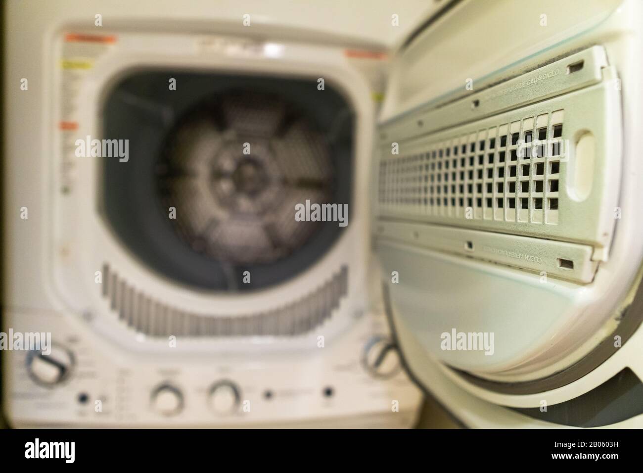 Dryer of a laundry machine, open door Stock Photo - Alamy