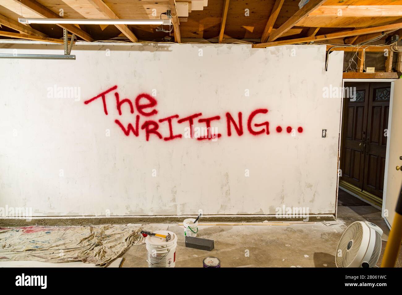 The Writing on the Wall in Red Stock Photo - Alamy