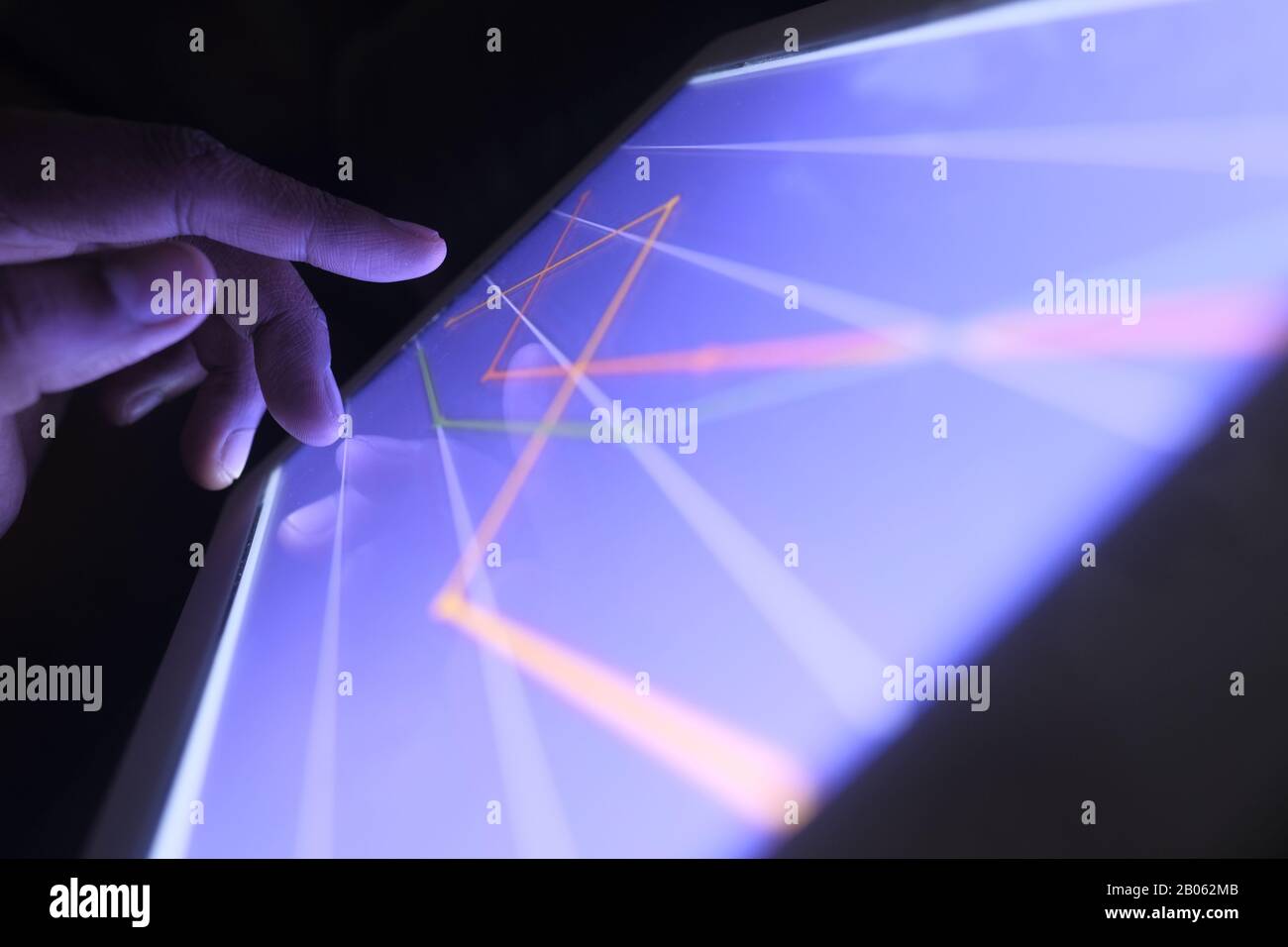 Close up of man hand analyzing chart on digital tablet Stock Photo - Alamy