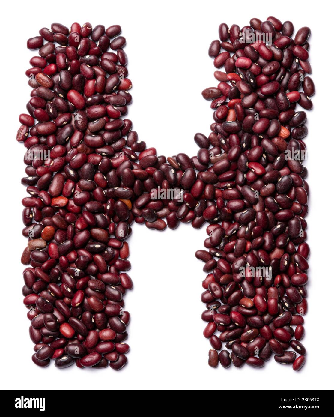 The letter "H" of the English alphabet from brown beans on a white ...