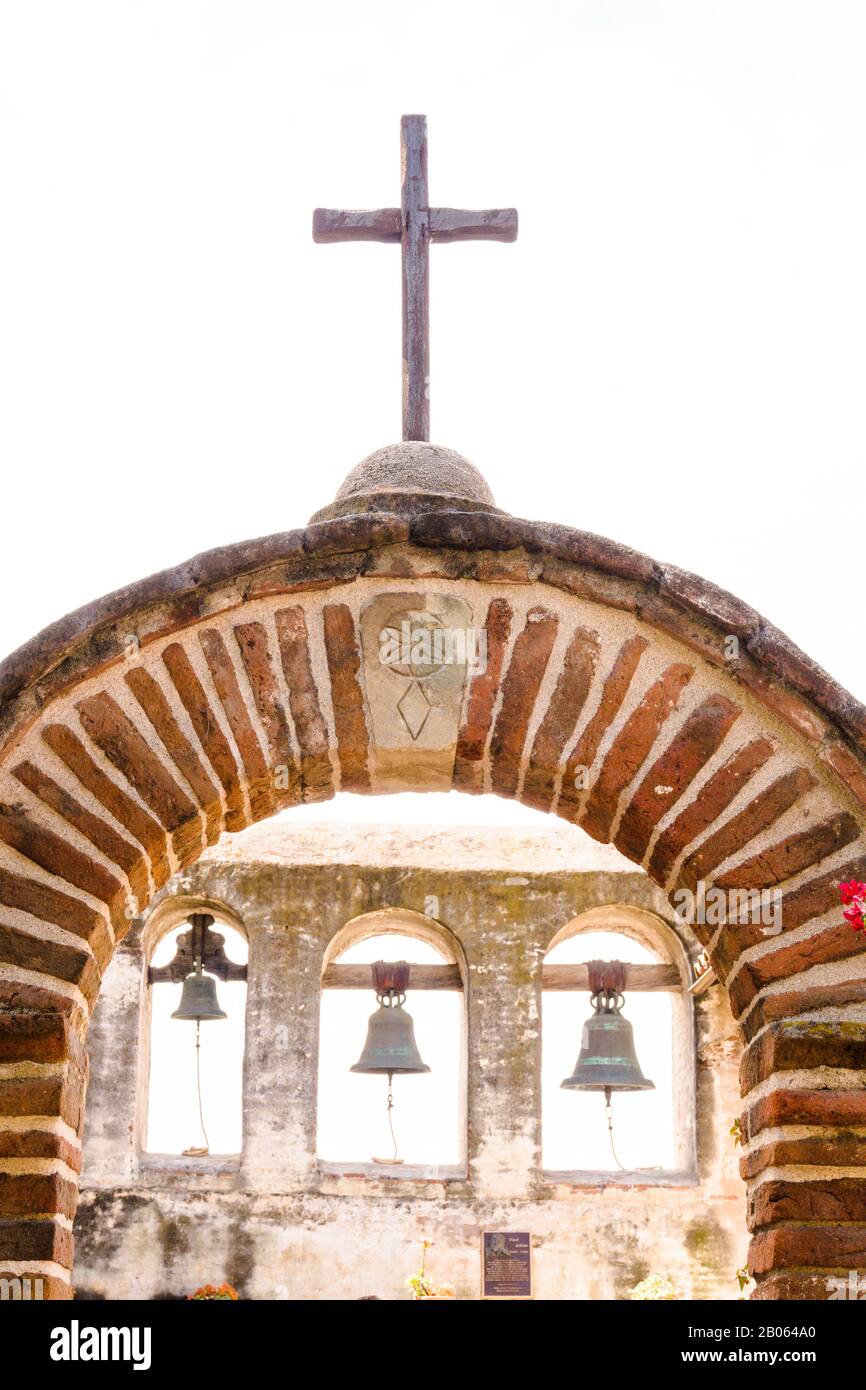 Church cross and Mission Bells in California with White Sky at Mission ...