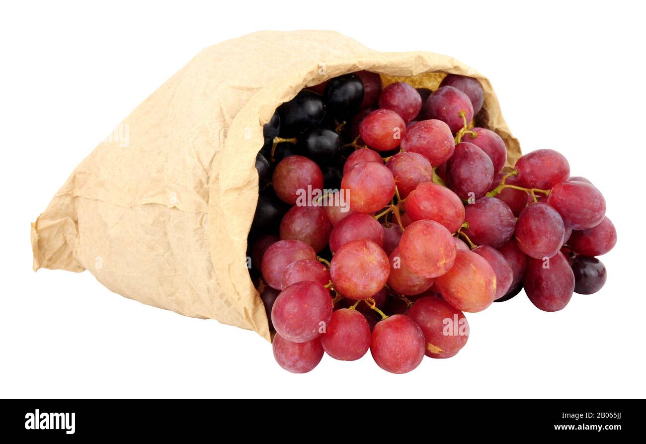 Fresh grapes in an environmentally friendly brown paper bag isolated on ...