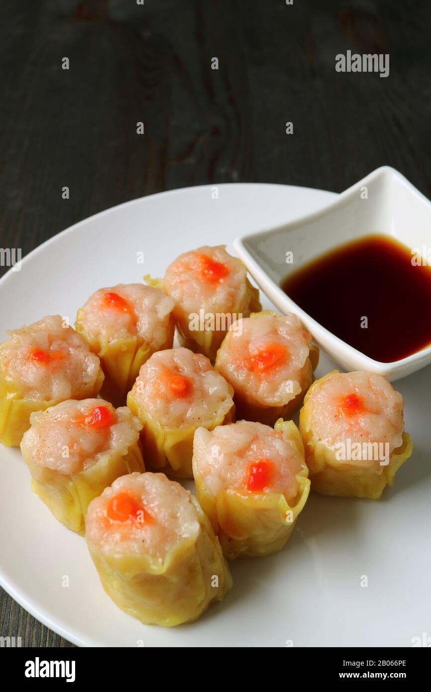 Vertical Image of Shrimp and Pork Filled Chinese Steamed Dumplings or ...