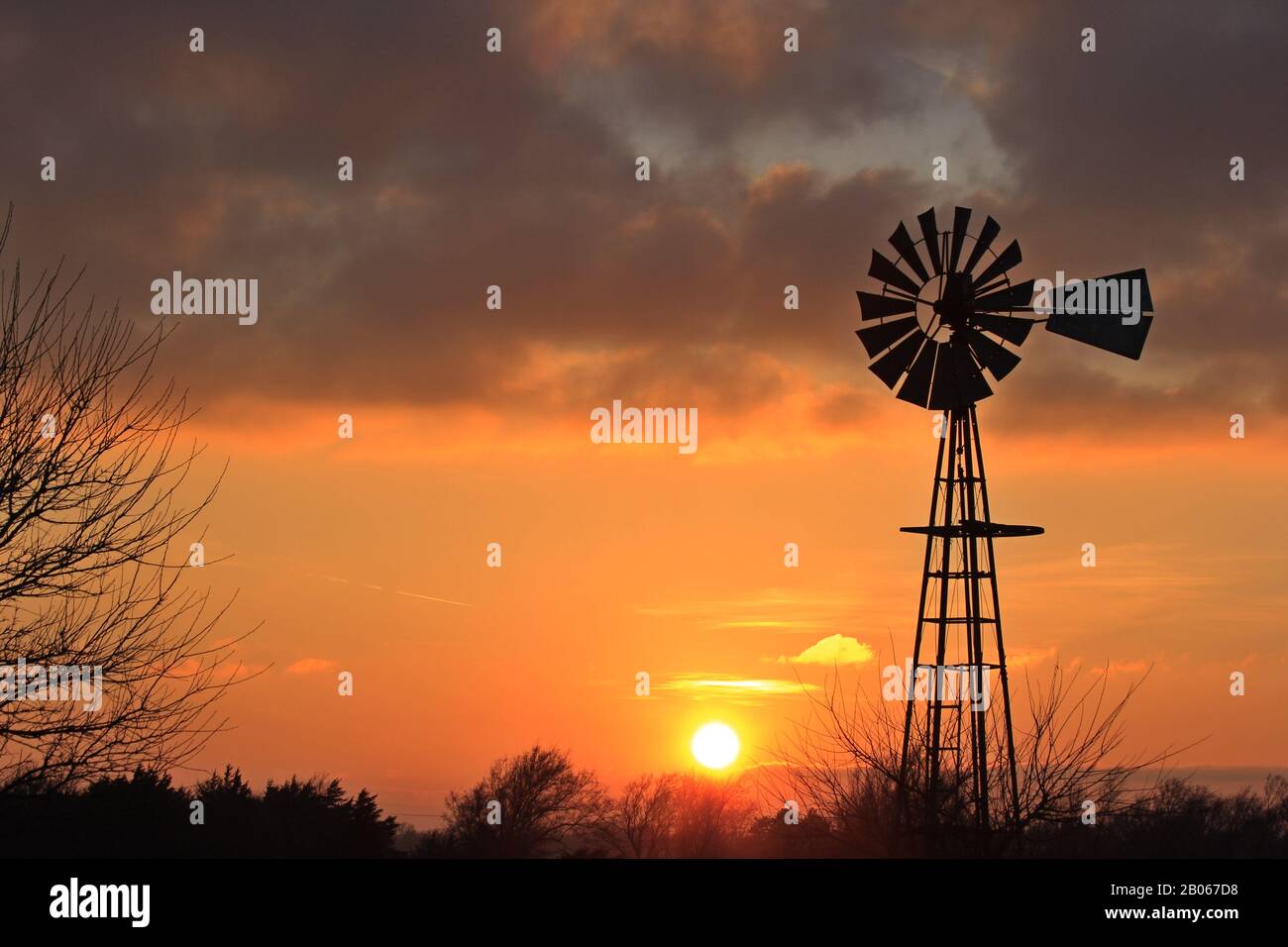 Kansas Golden Orange Sunset with a Windmill Silhouette,tree's,clouds ...