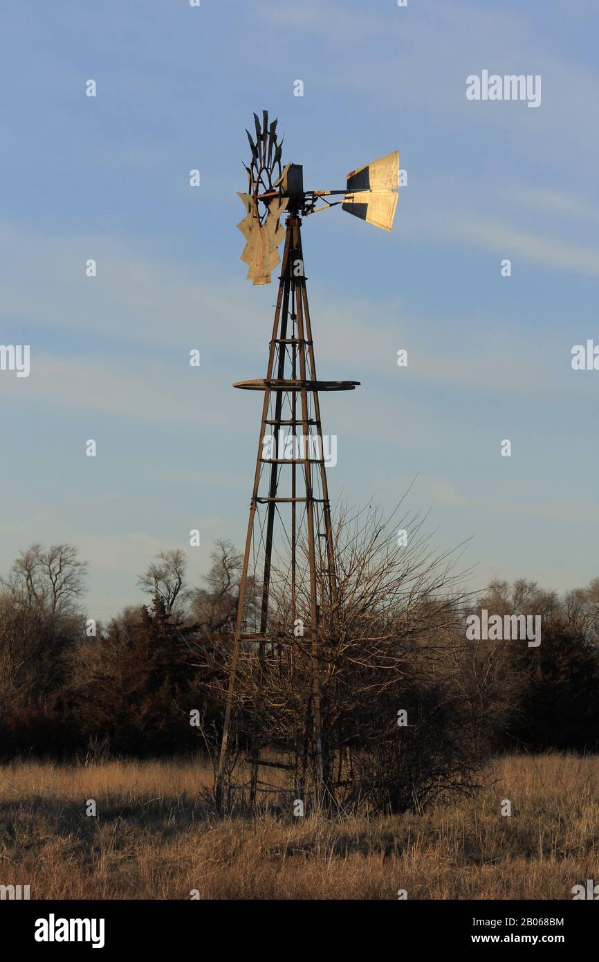 Kansas Country Windmill with blue sky and Tree's out in the country ...