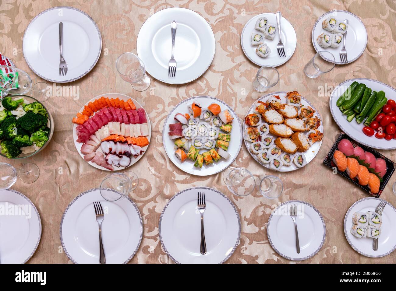 View from above at a table with sushi, sashimi, nigiri-sushi ...