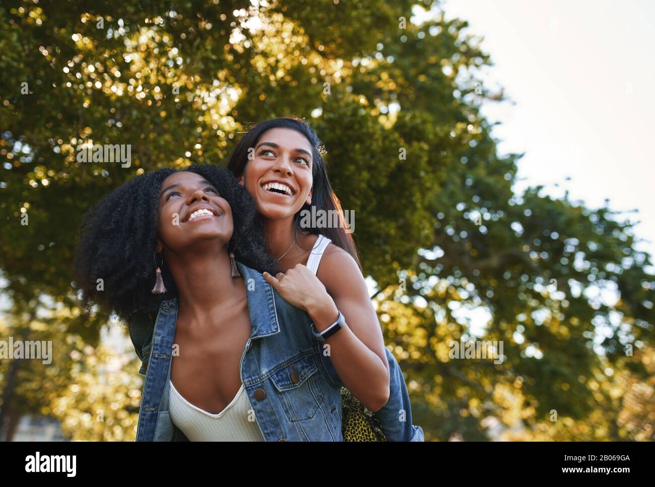 Giving a piggyback ride hi-res stock photography and images - Alamy
