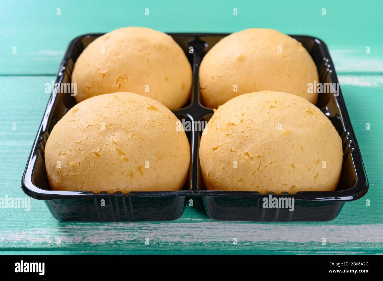 side view sweet puffs on a green table Stock Photo - Alamy