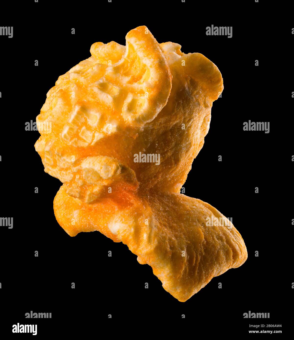 Single popped popcorn on a black background with clipping path Stock ...