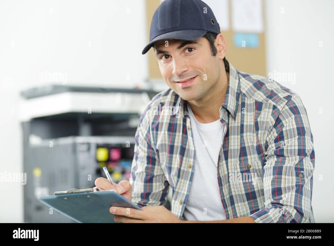 a man is working with printer Stock Photo - Alamy