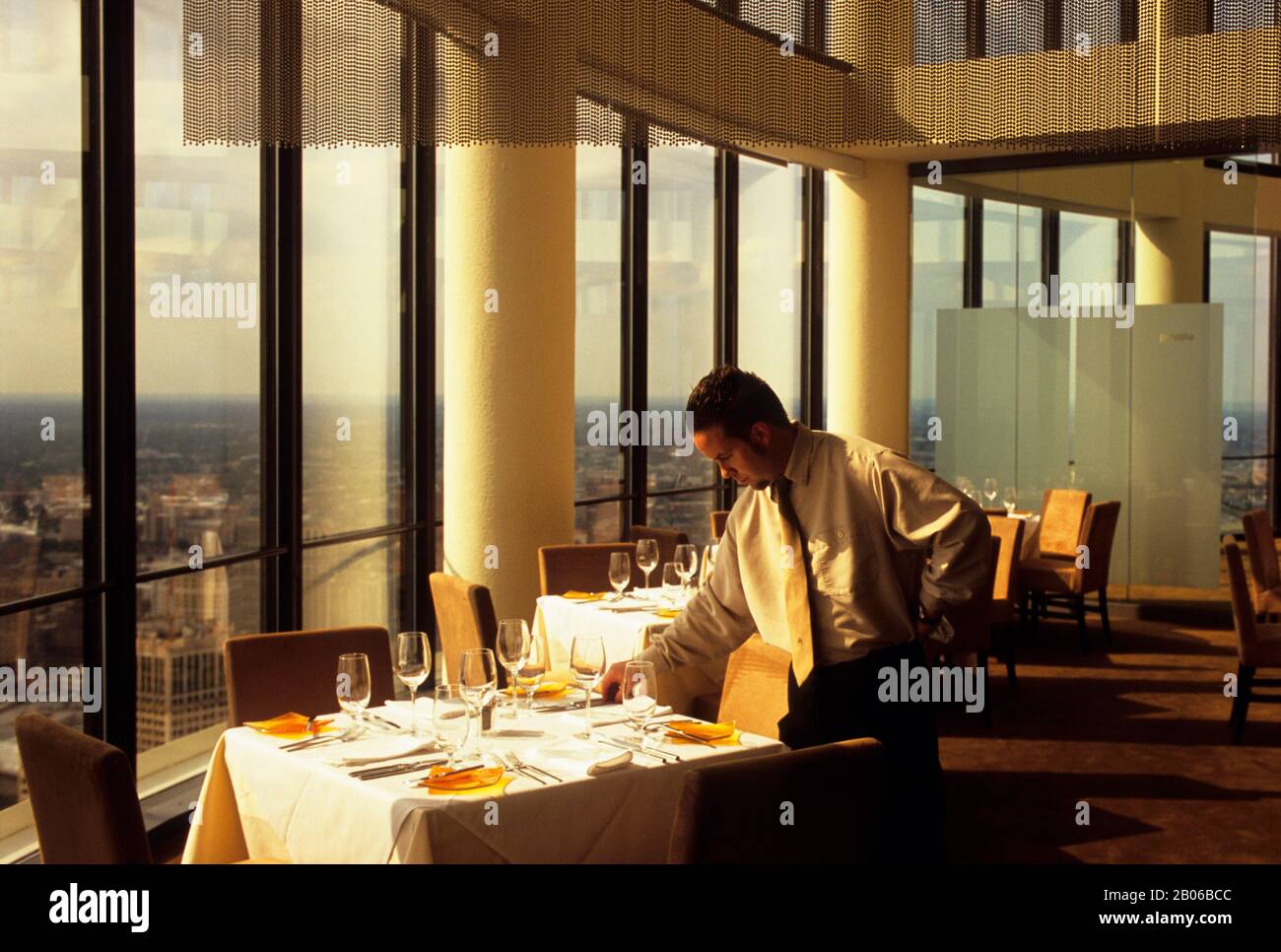 USA, MICHIGAN, DETROIT, RENAISSANCE CENTER, COACH INSIGNIA, WAITER ...