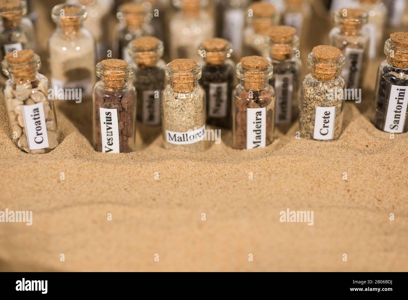 Glass test-tube with sand of different summer vacation countries Stock ...
