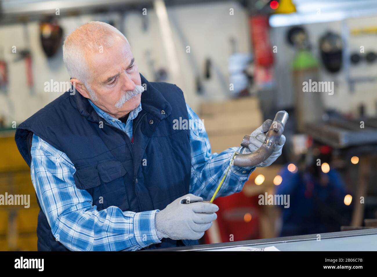 elderly man at workplace Stock Photo - Alamy