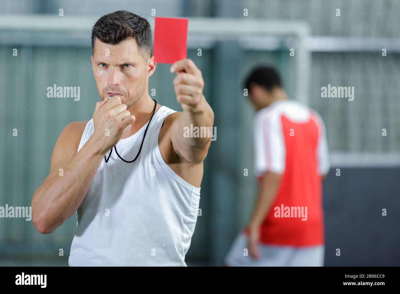 a referee showing red card Stock Photo - Alamy