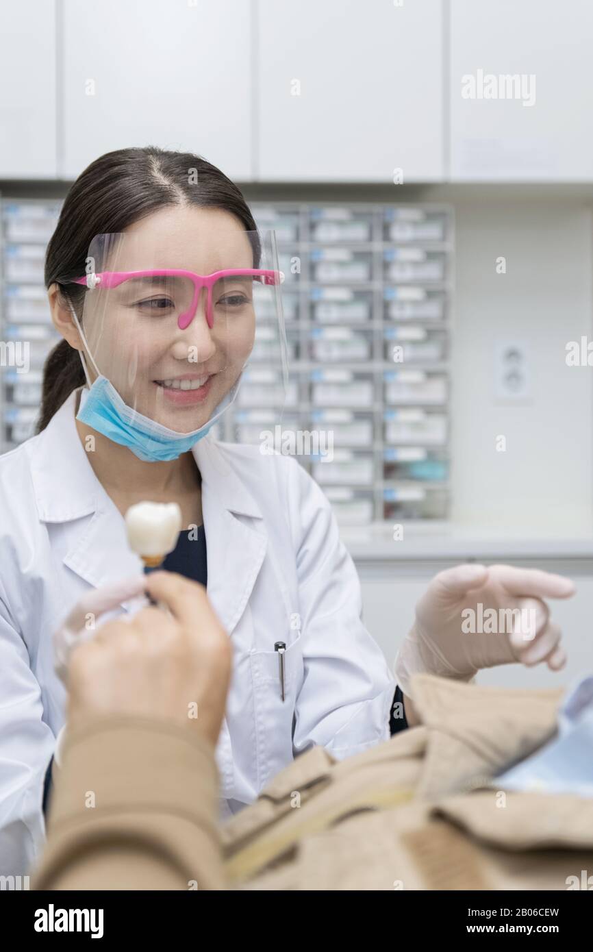 Healthcare, medicine and people concept. Female or Male doctor working ...