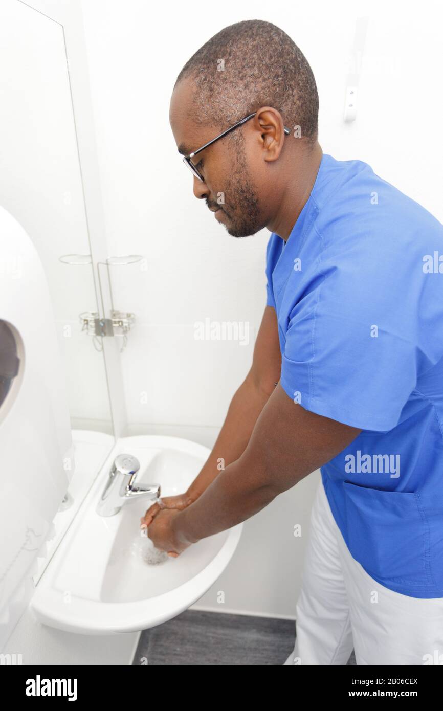 doctor washing hands in a clinic Stock Photo - Alamy
