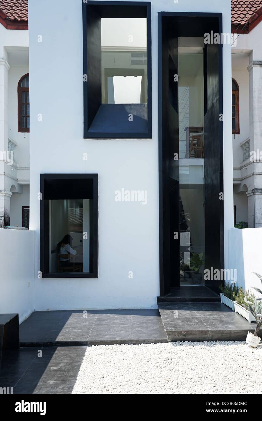 Exterior design and front store architecture of local coffee bar among ...