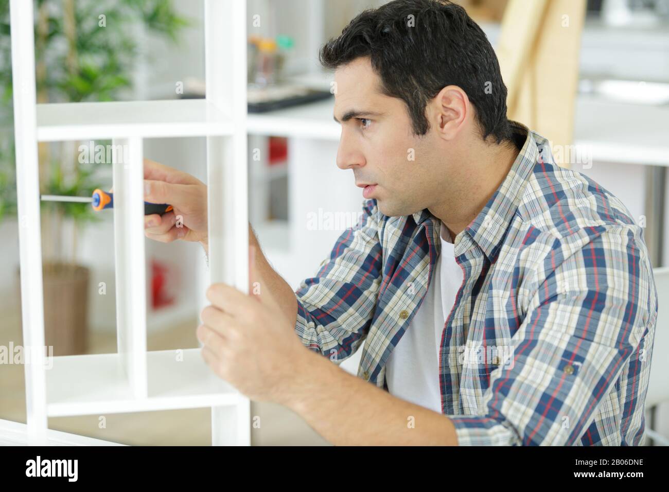 male furniture designer at work Stock Photo - Alamy