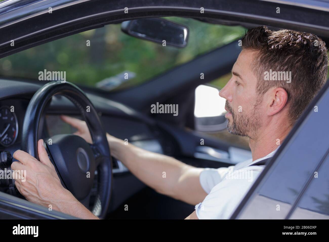 a man in a car Stock Photo - Alamy