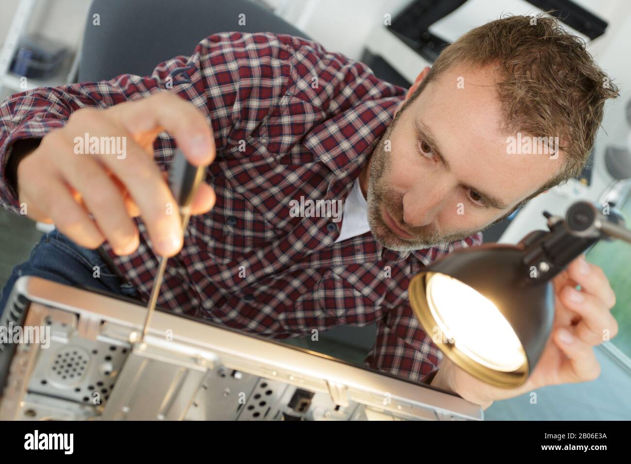fixing motherboard cable wires and video card Stock Photo - Alamy