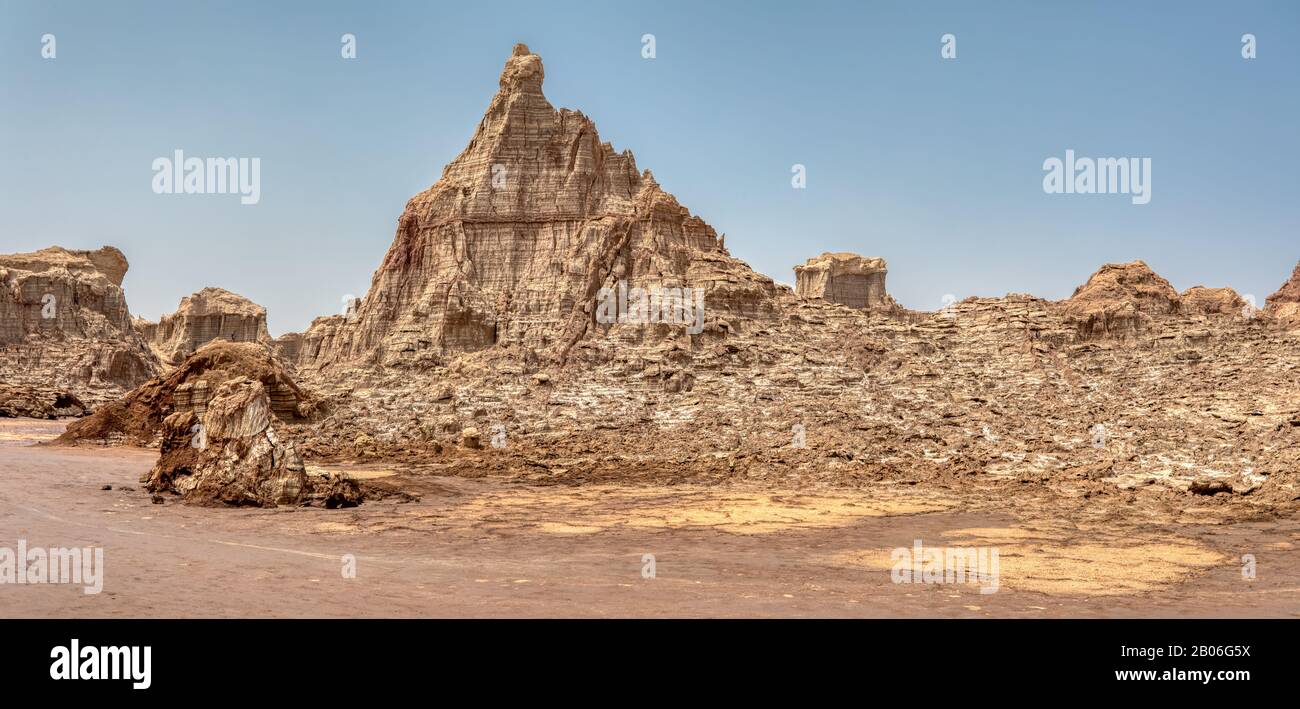 High rock formations rise in the Danakil depression like stone rock ...