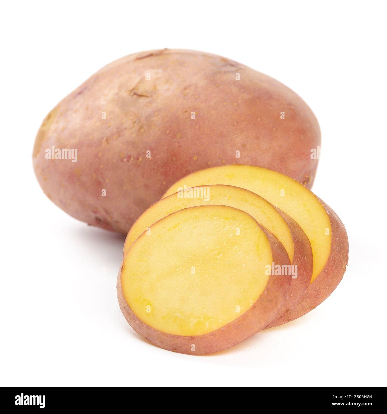 raw potato tuber with slices isolated on white Stock Photo - Alamy