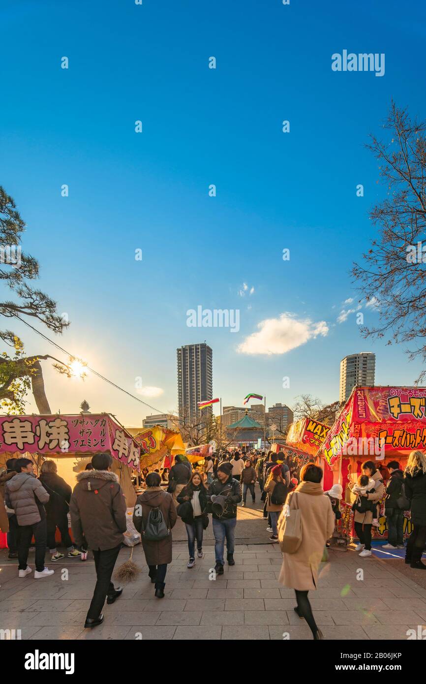 ueno, japan - january 02 2020: People walking in peddlers or carnies or ...