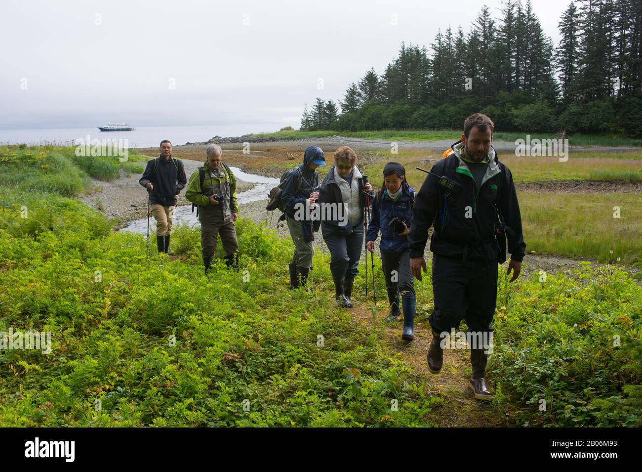 People hiking at Idaho Inlet on Chichagof Island, Tongass National ...