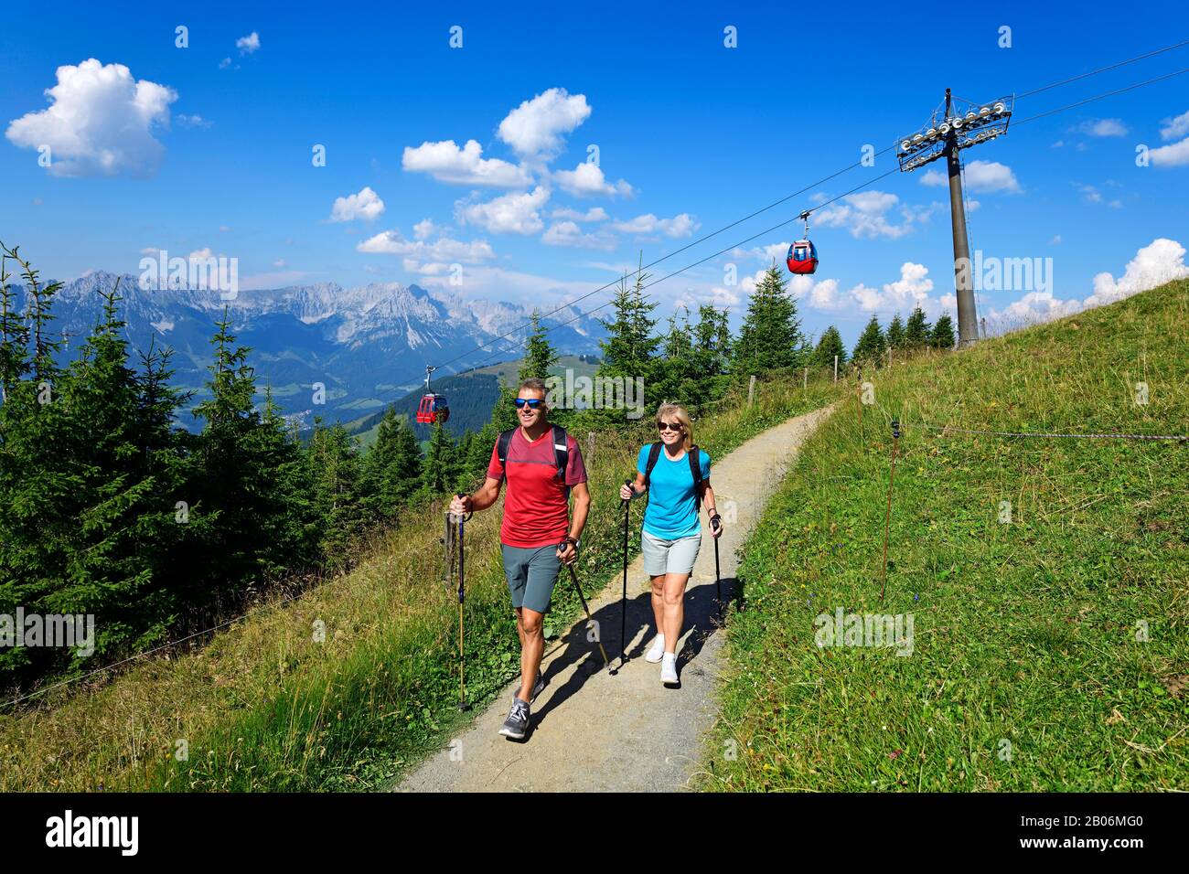 Hikers on the summit panorama trail of the Hohe Salve, Hopfgarten ...