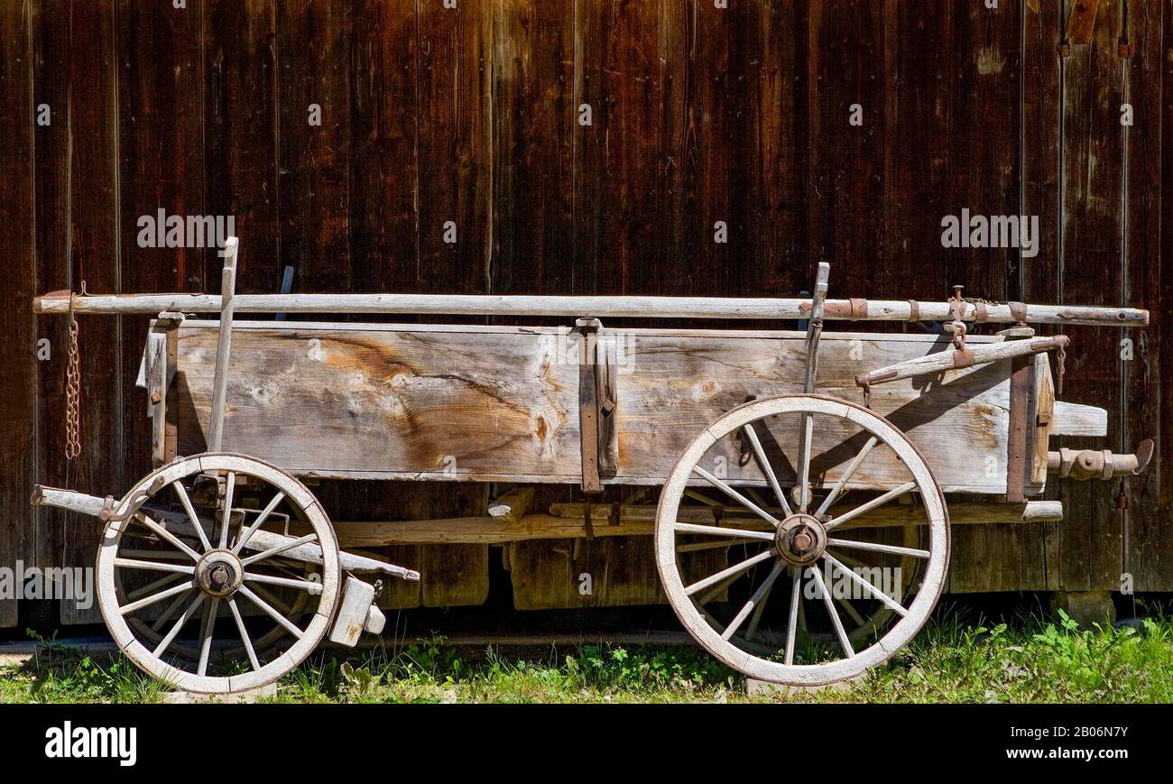 Historical cart stands in front of a barn, Salzburg Open Air Museum ...