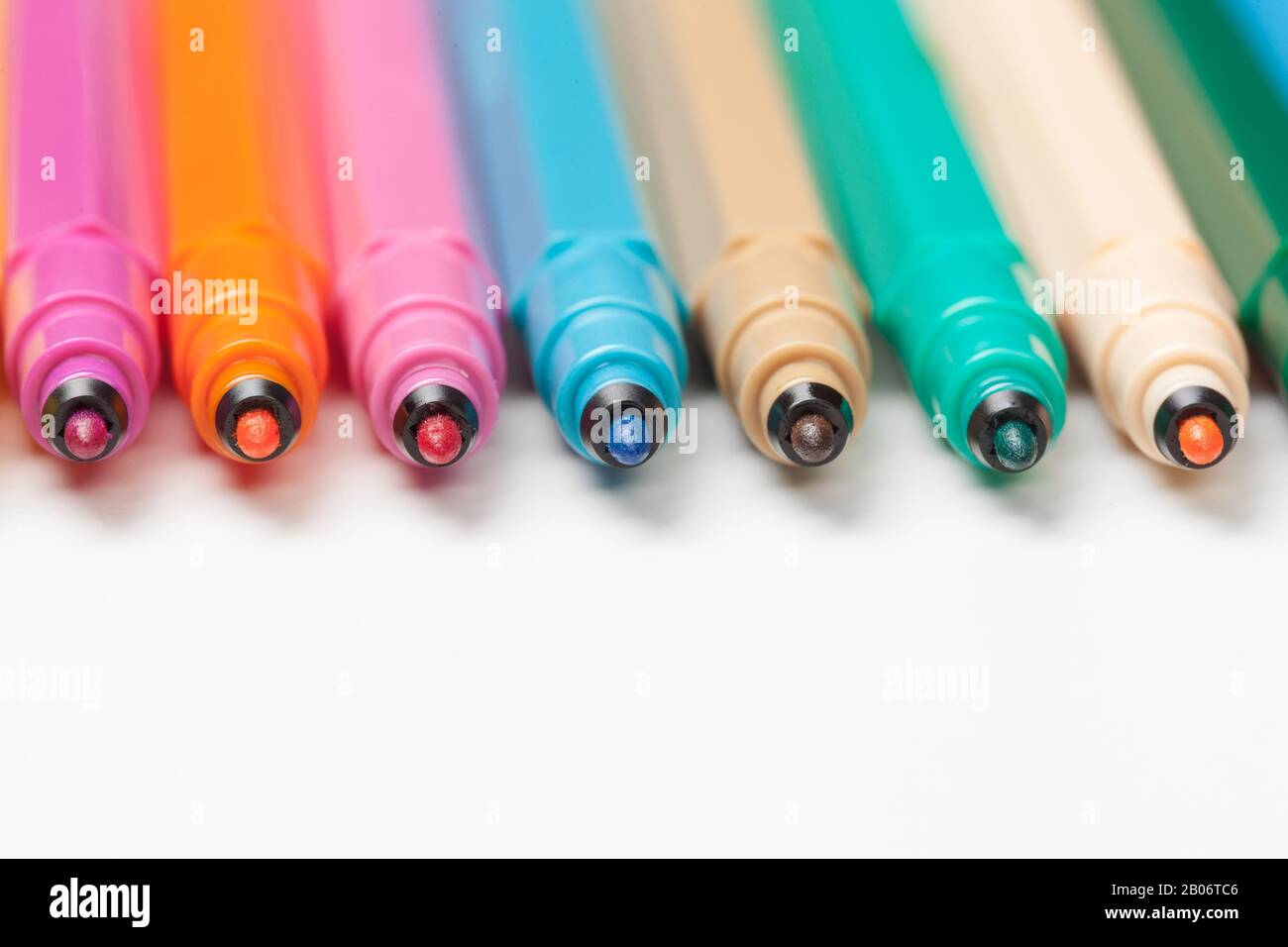 Colored markers isolated on white background. Creative Photo Stock ...