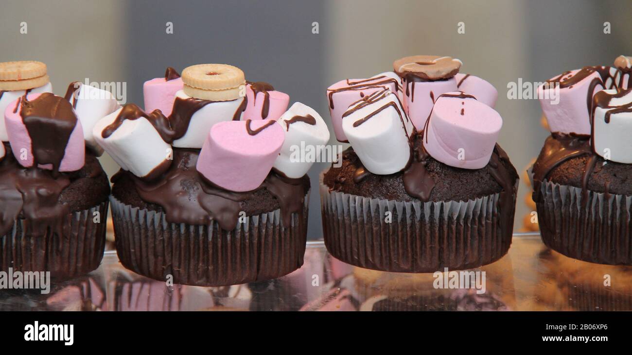 A Row of Sweet Confectionery Dessert Cakes Stock Photo - Alamy