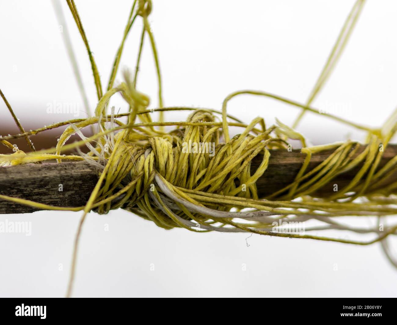 abstract picture with yellow twine texture, twine ball on fuzzy ...