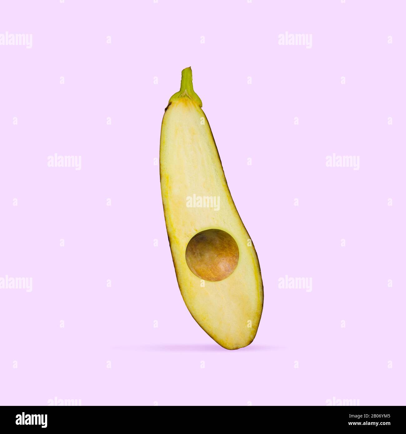Avocado as a zucchini on pastel purple background. Copyspace to insert ...