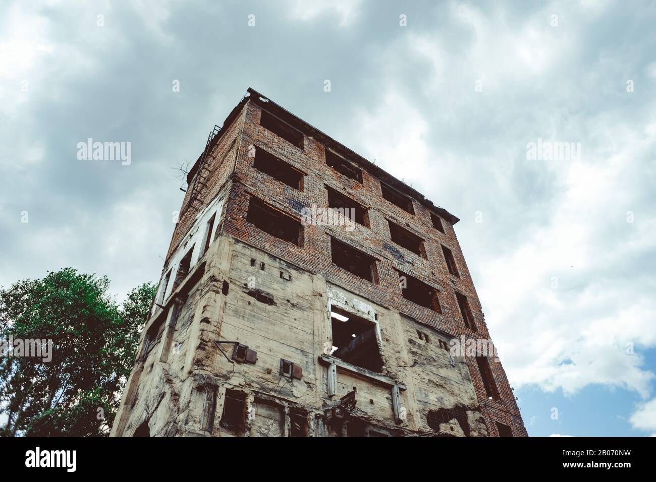 an old ruined building a tall tower against the sky Stock Photo - Alamy