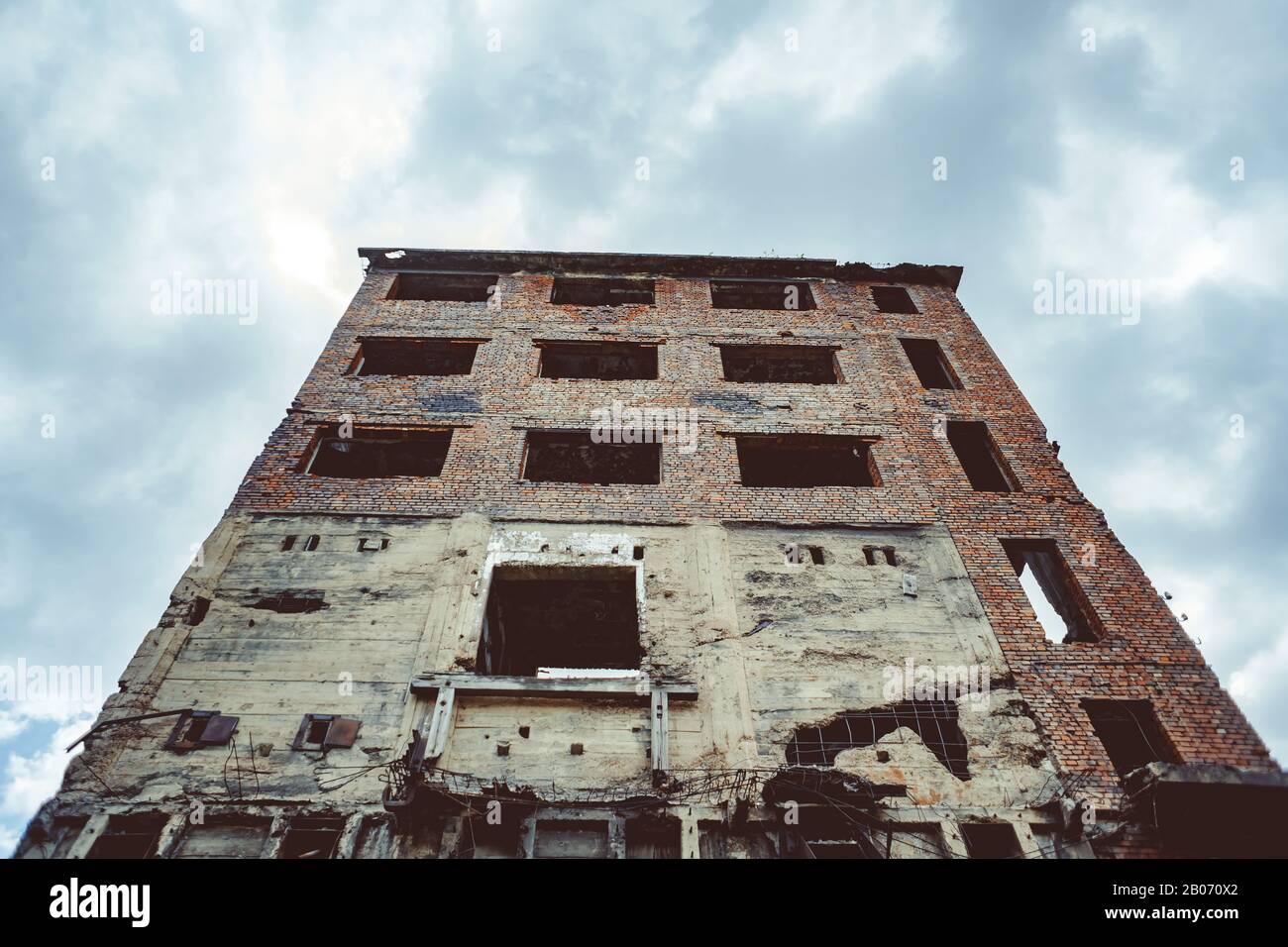 an old ruined building a tall tower against the sky Stock Photo - Alamy