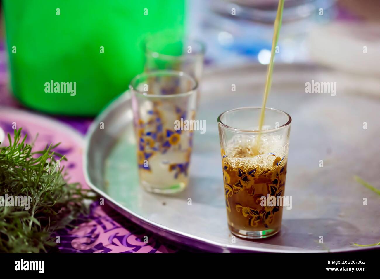 Moroccan tea kettle glasses hi-res stock photography and images - Alamy