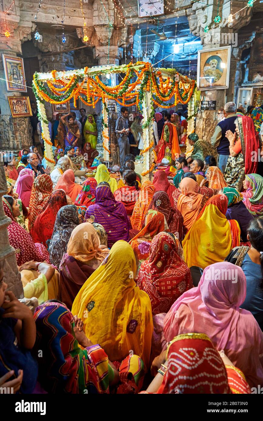 indian women with colorful clothes during ceremony inside Jagdish ...