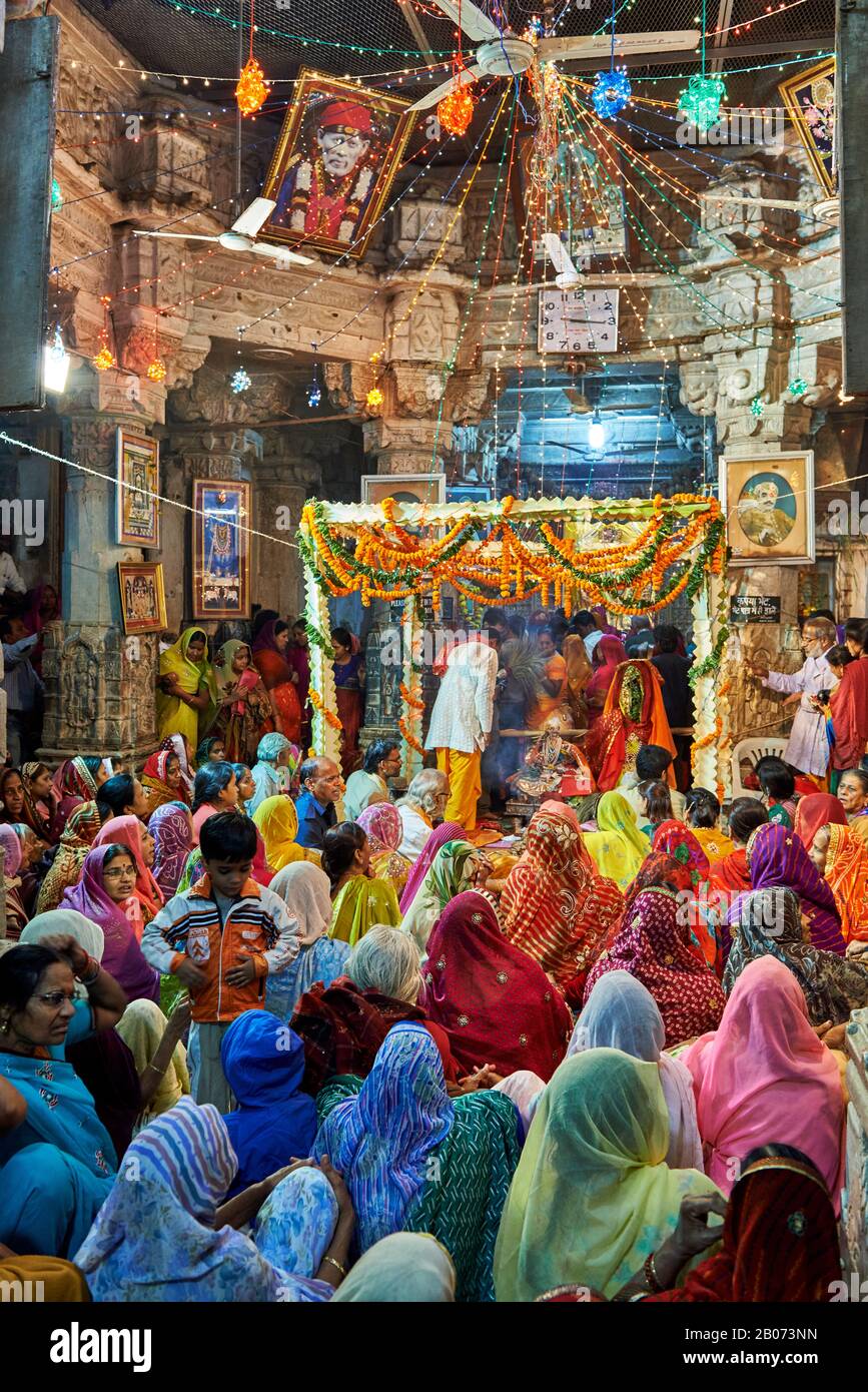indian women with colorful clothes during ceremony inside Jagdish ...