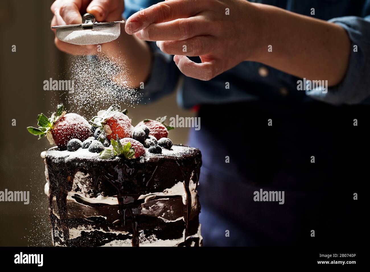 Female chef confectionery making cake hi-res stock photography and ...