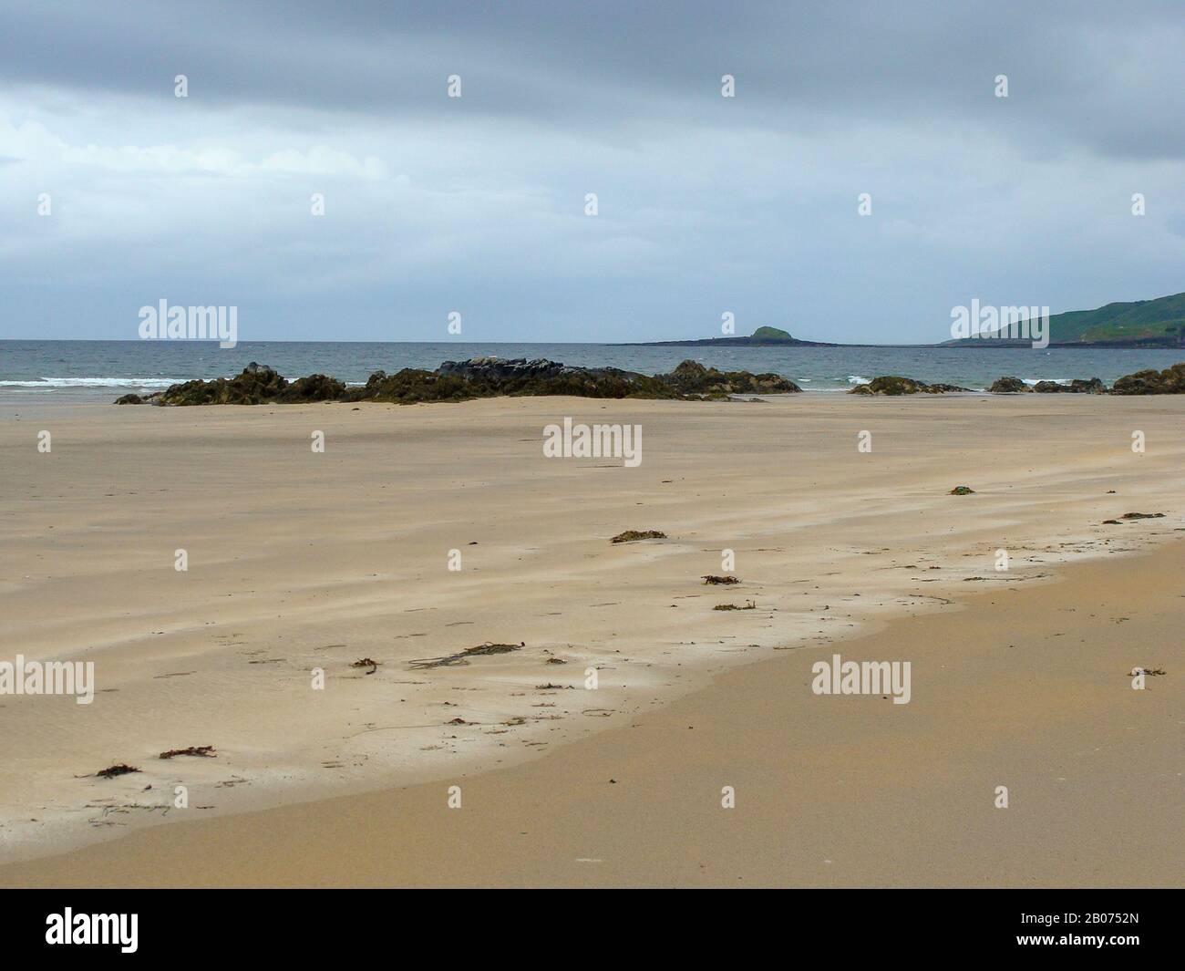 ocean sandy beach, beautiful sand texture and cliffs Stock Photo - Alamy