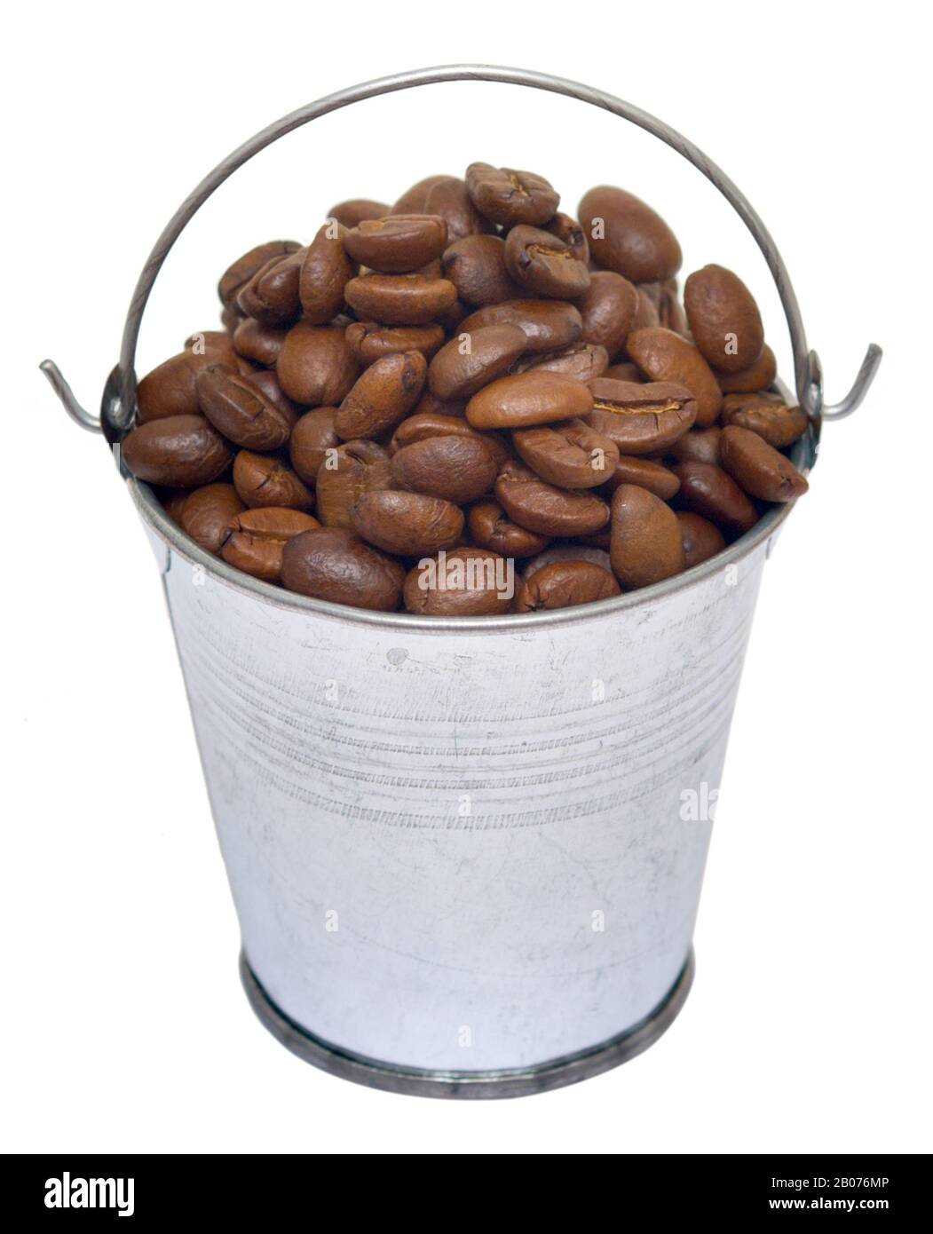Coffee beans in a bucket isolated on white background Stock Photo - Alamy