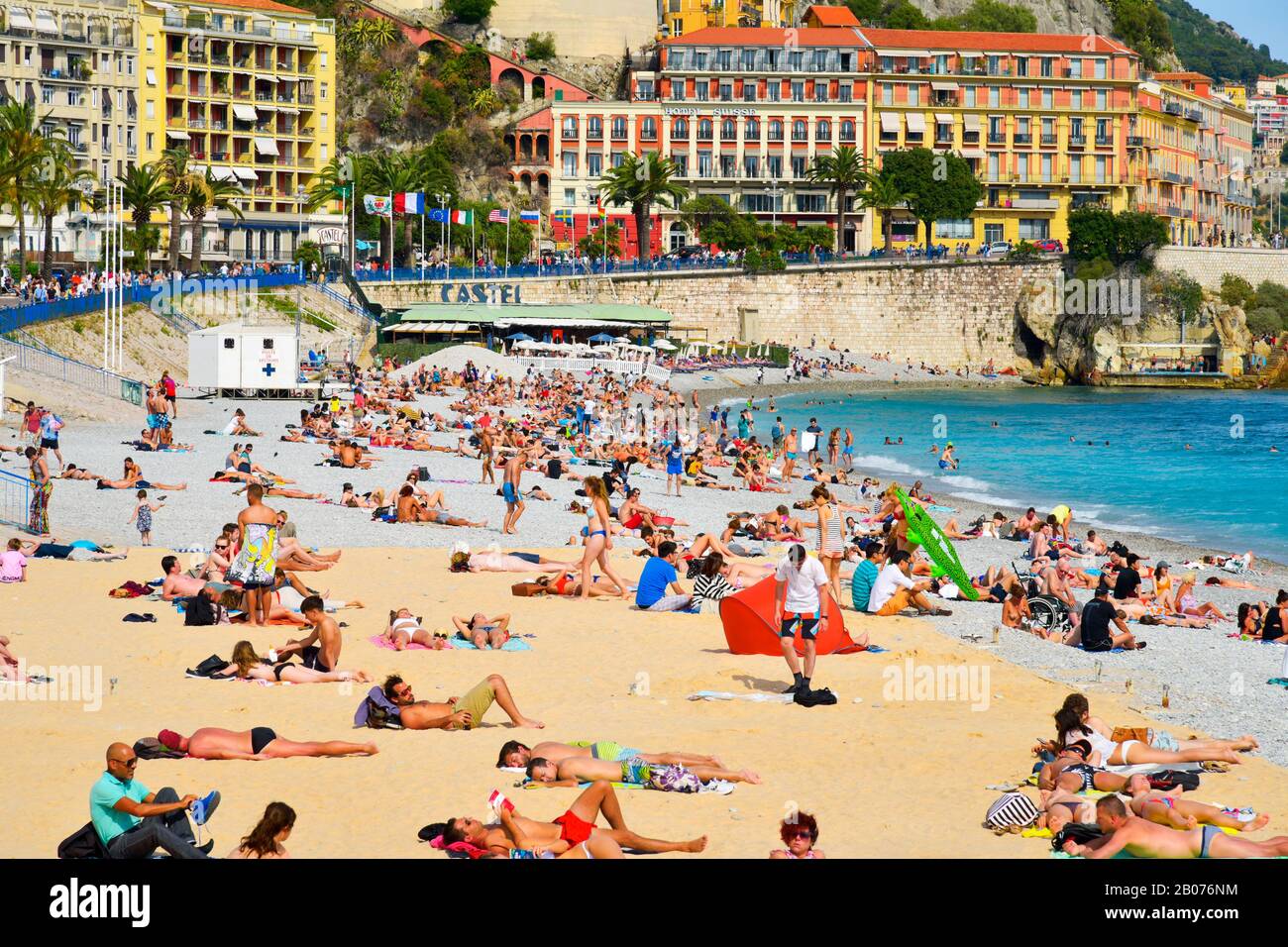 NICE, FRANCE - JUNE 4, 2017: People sunbathing on the beach in Nice, in ...