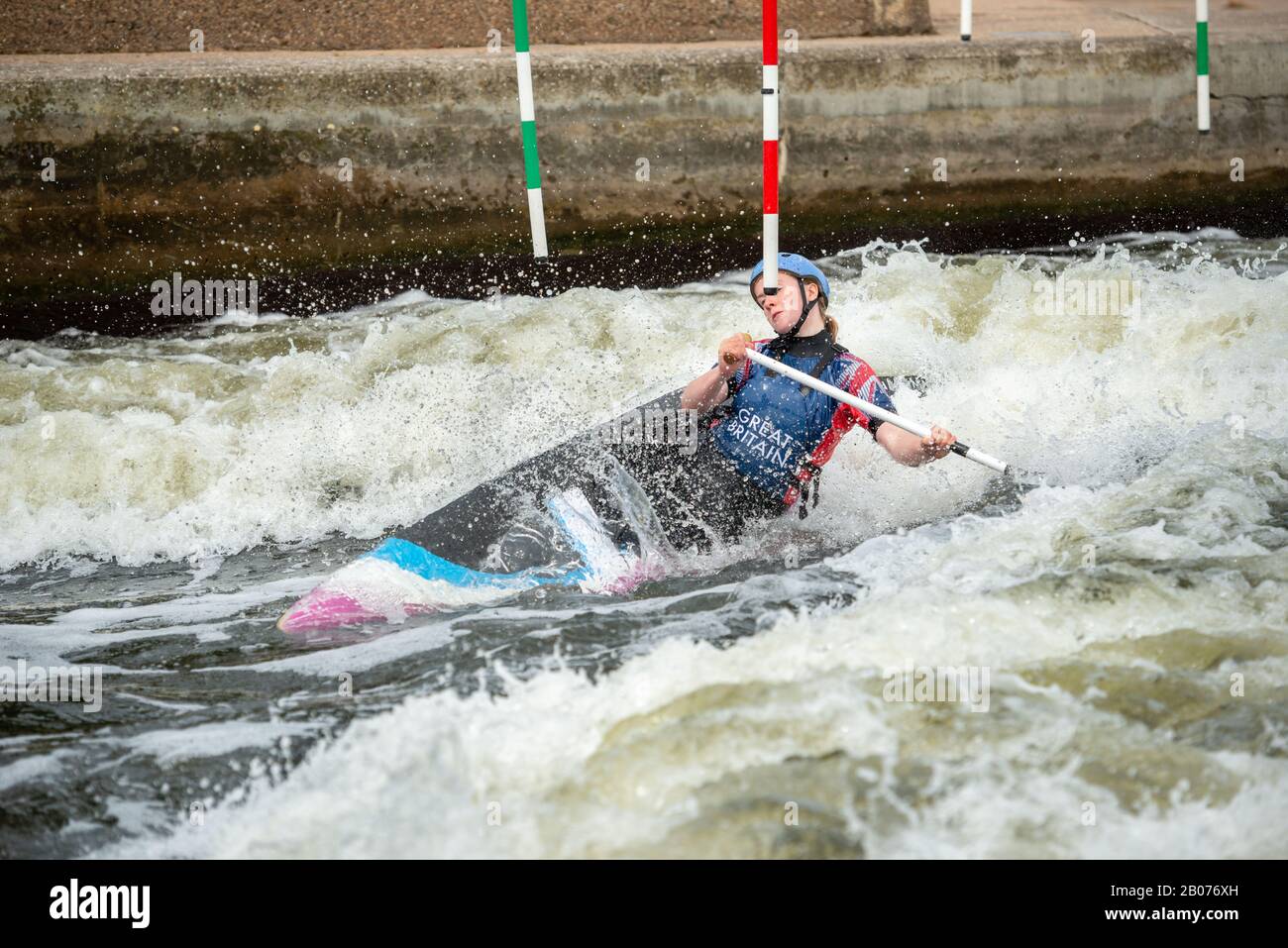 GB Canoe Slalom Athlete in the women's C1W class stretching to get ...