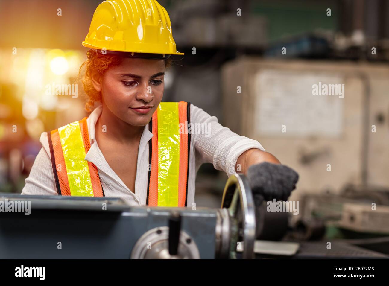 Girl teen worker african american working labor in industry factory ...